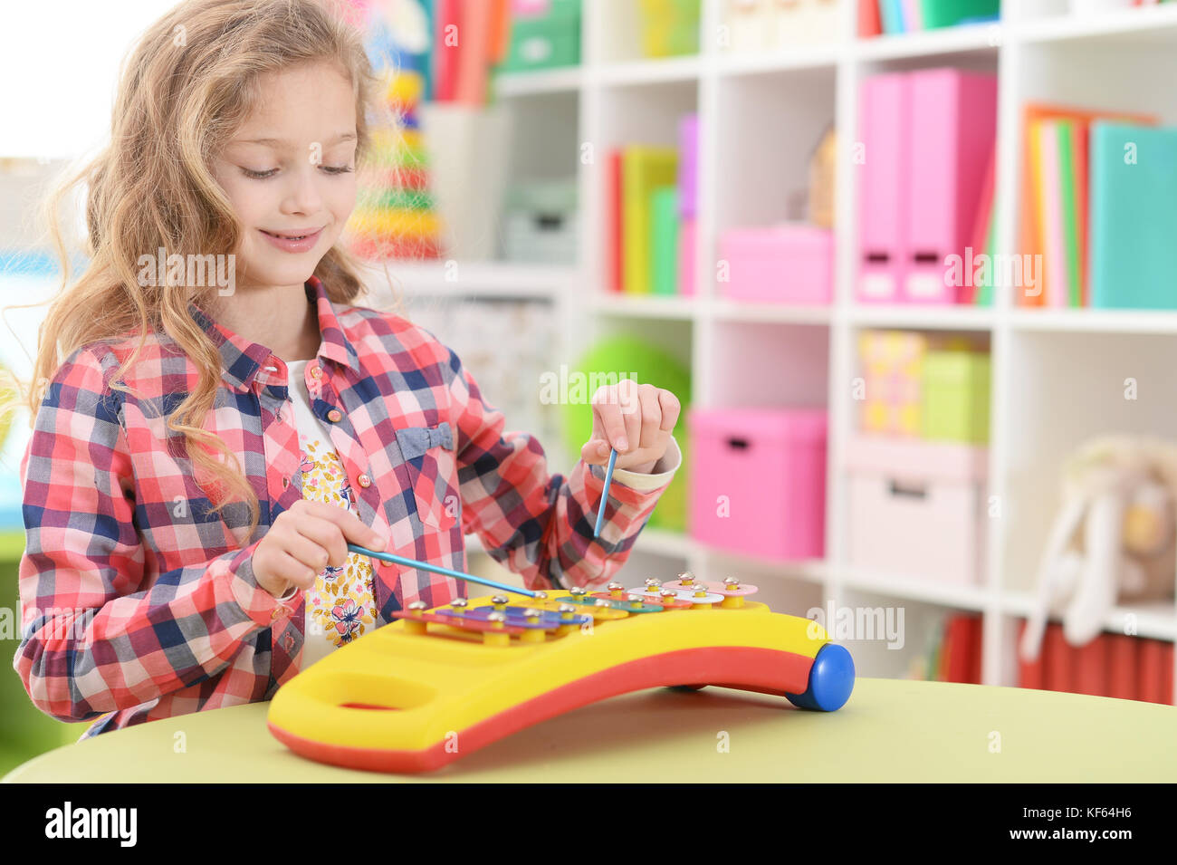 Beautiful girl playing Stock Photo - Alamy
