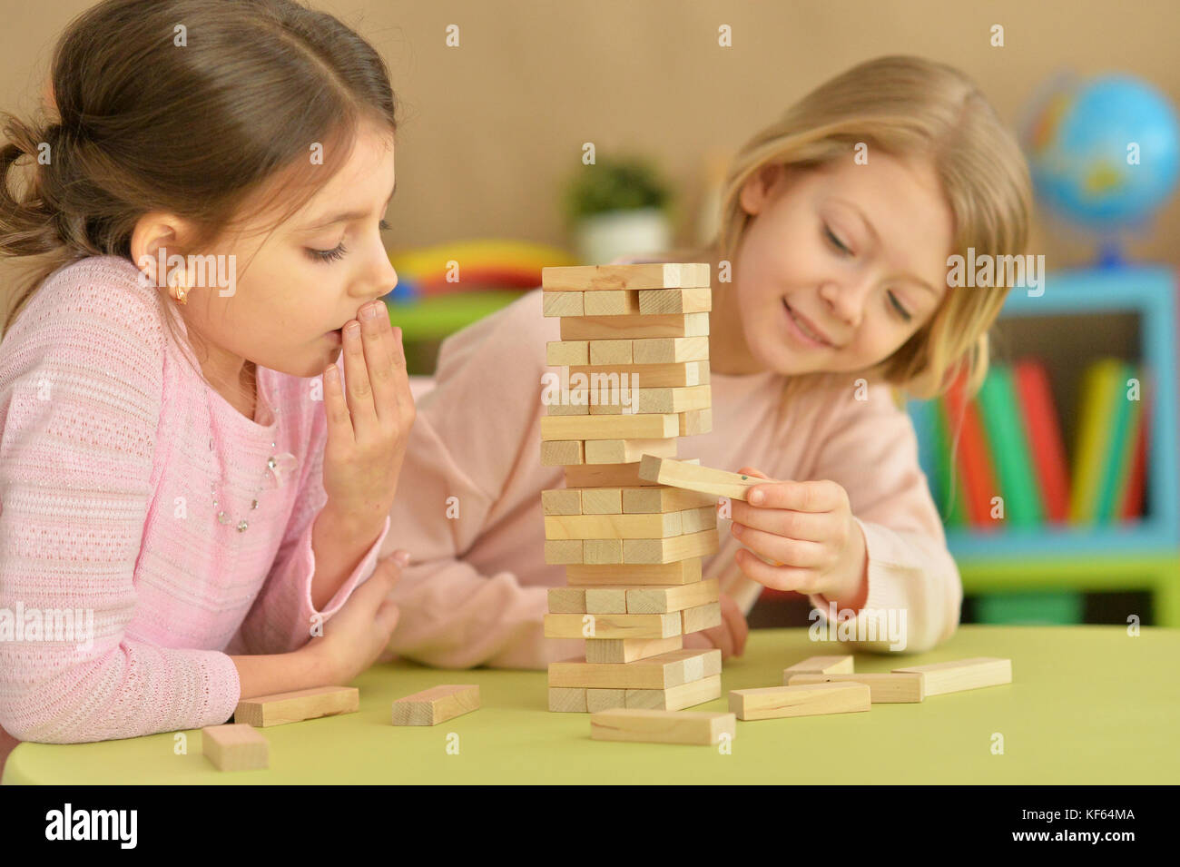 girls playing with blocks Stock Photo - Alamy