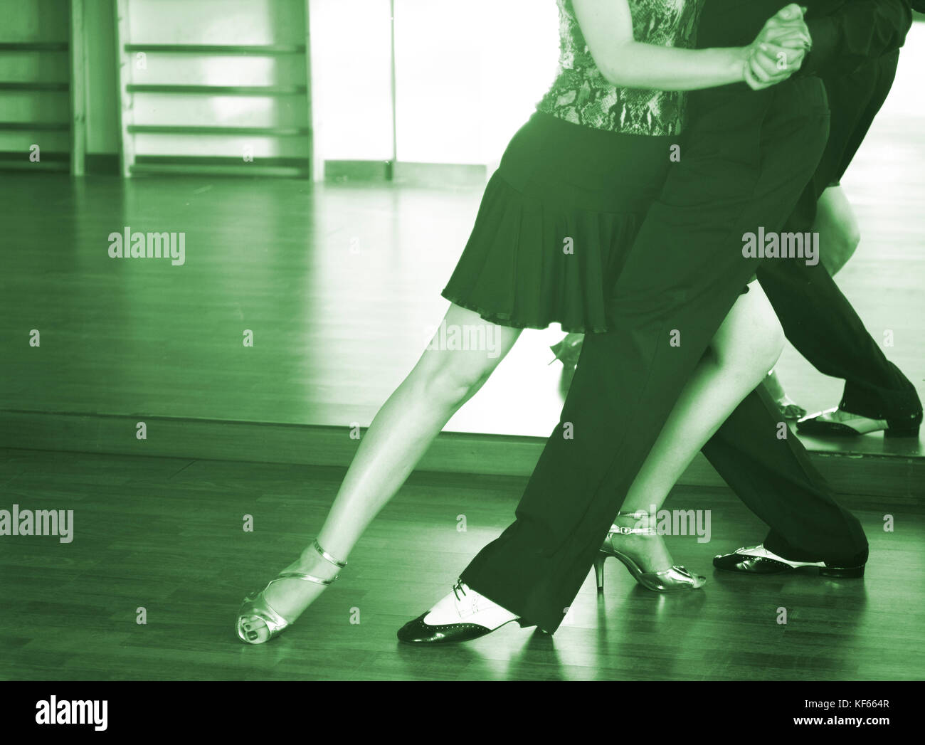 Ballroom dance couple of dancers and teachers in studio school dancing ...