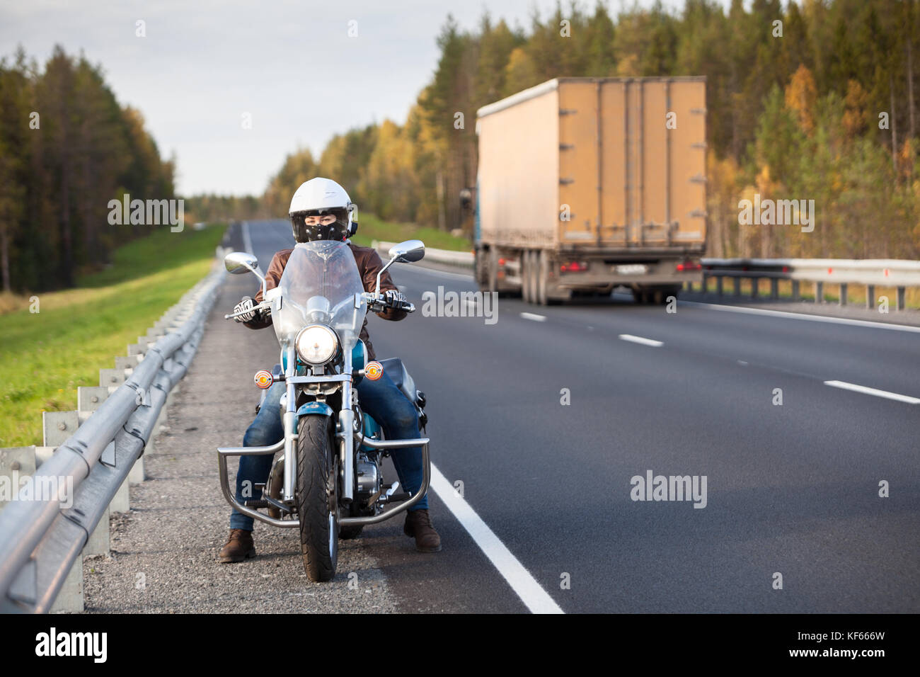 Truck passing motorcycle hi-res stock photography and images - Alamy