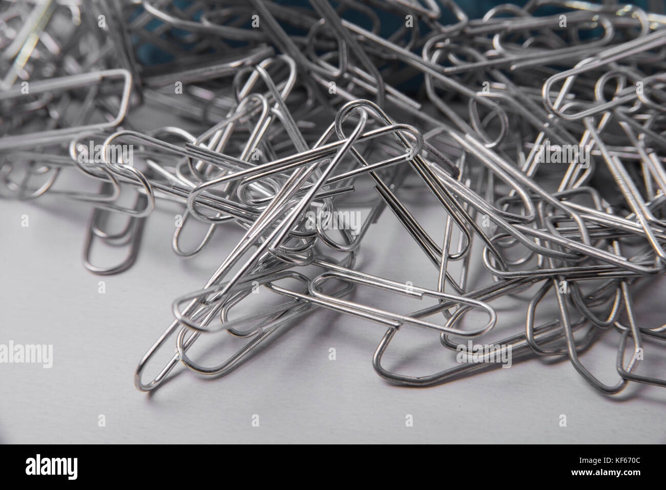 Paper clips closeup on the office table Stock Photo - Alamy