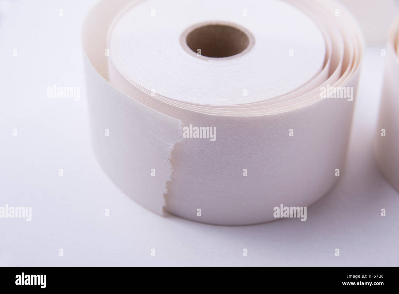 Blank roll paper for cashier on white background Stock Photo - Alamy