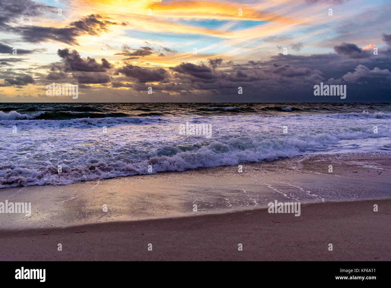 early morning sky colors at the beach Stock Photo - Alamy