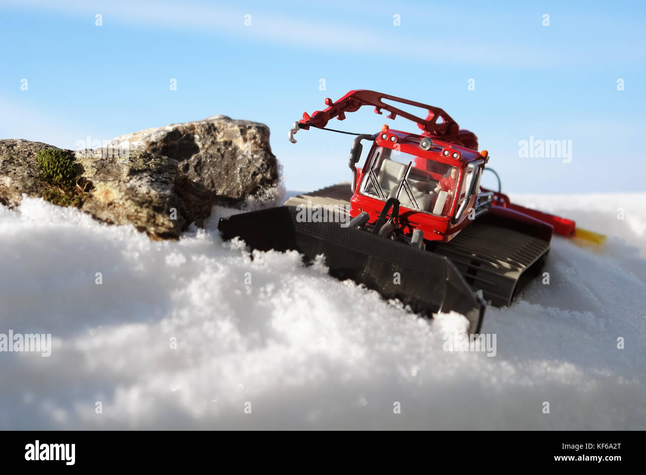 A red ratrak on white snow on a winter sunny day Stock Photo - Alamy