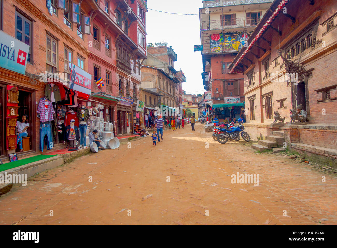 BHAKTAPUR, NEPAL - NOVEMBER 04, 2017: Unidentified family walking in ...