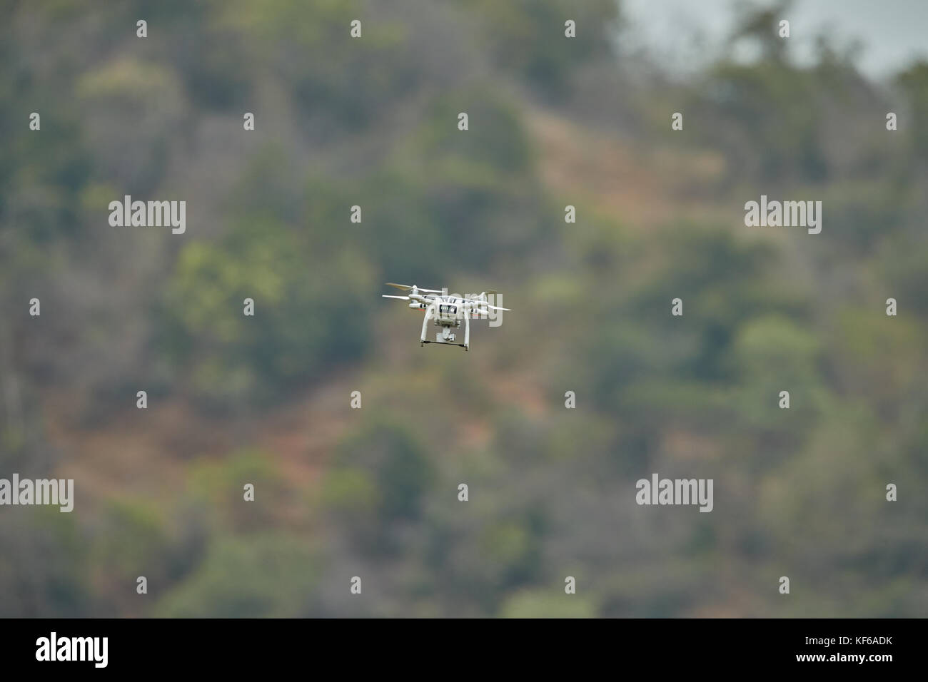 drone quad copter with high resolution digital camera flying hovering ...