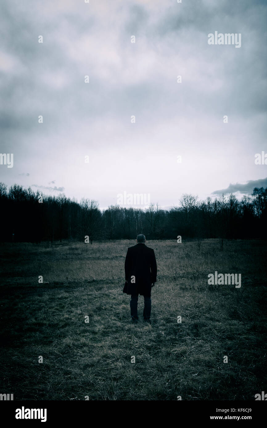Man in coat back hi-res stock photography and images - Alamy