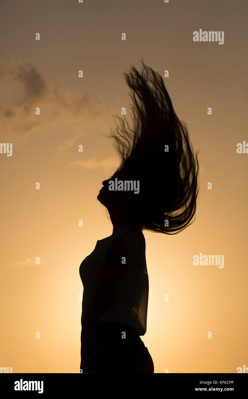 Flick hair hi-res stock photography and images - Alamy