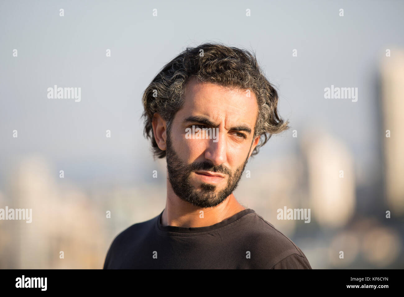 Portrait of a Middle Eastern man outdoors Stock Photo - Alamy