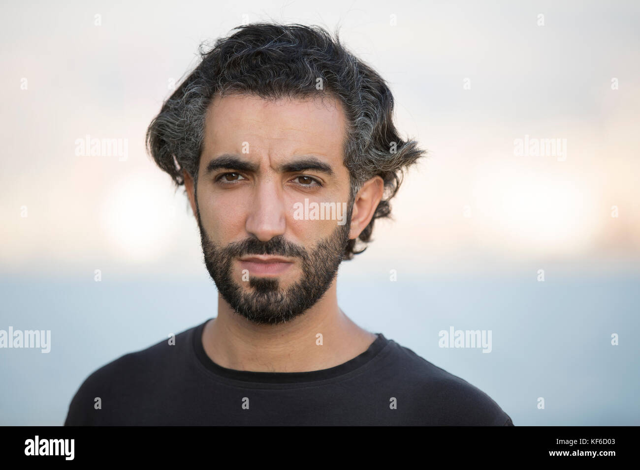 Portrait of a Middle Eastern man outdoors Stock Photo - Alamy