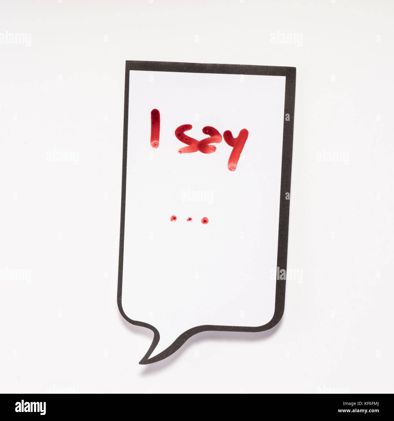 a white memo pad with the shape of a comic with the inscription "I say ...