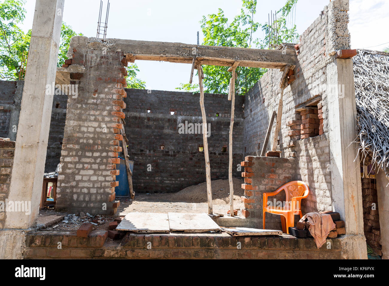Being built house , not finish but already lived. India Stock Photo - Alamy