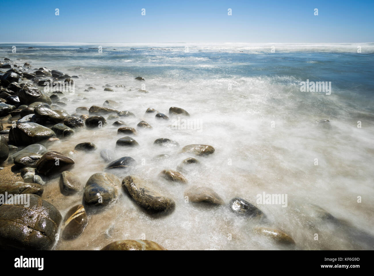 Beach and rocks Stock Photo - Alamy