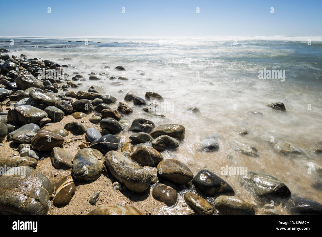 Beach and rocks Stock Photo - Alamy