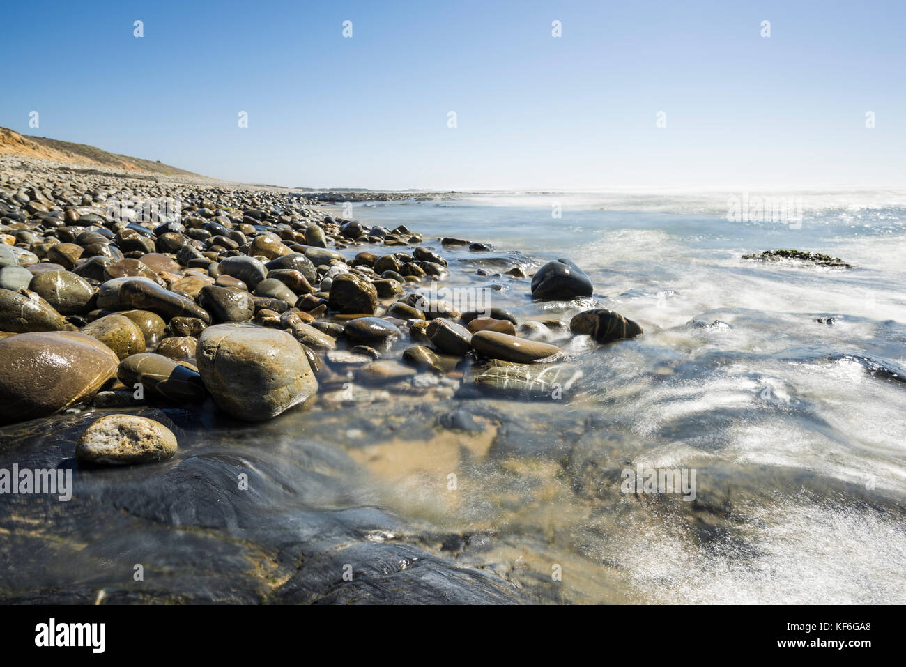 Beach and rocks Stock Photo - Alamy