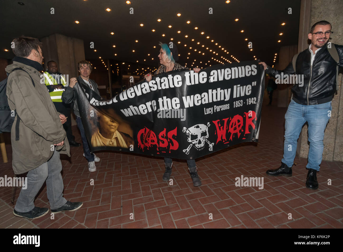 London, UK. 25th Oct, 2017. Class War laugh at a security officer who ...