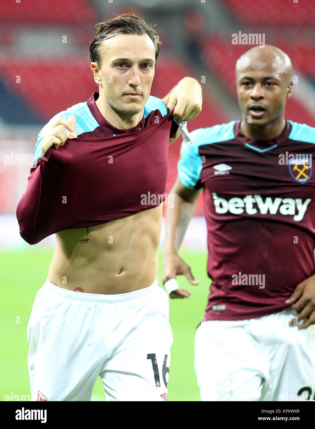 London, UK. 25th October 2017. Mark Noble shirtless of West Ham United ...