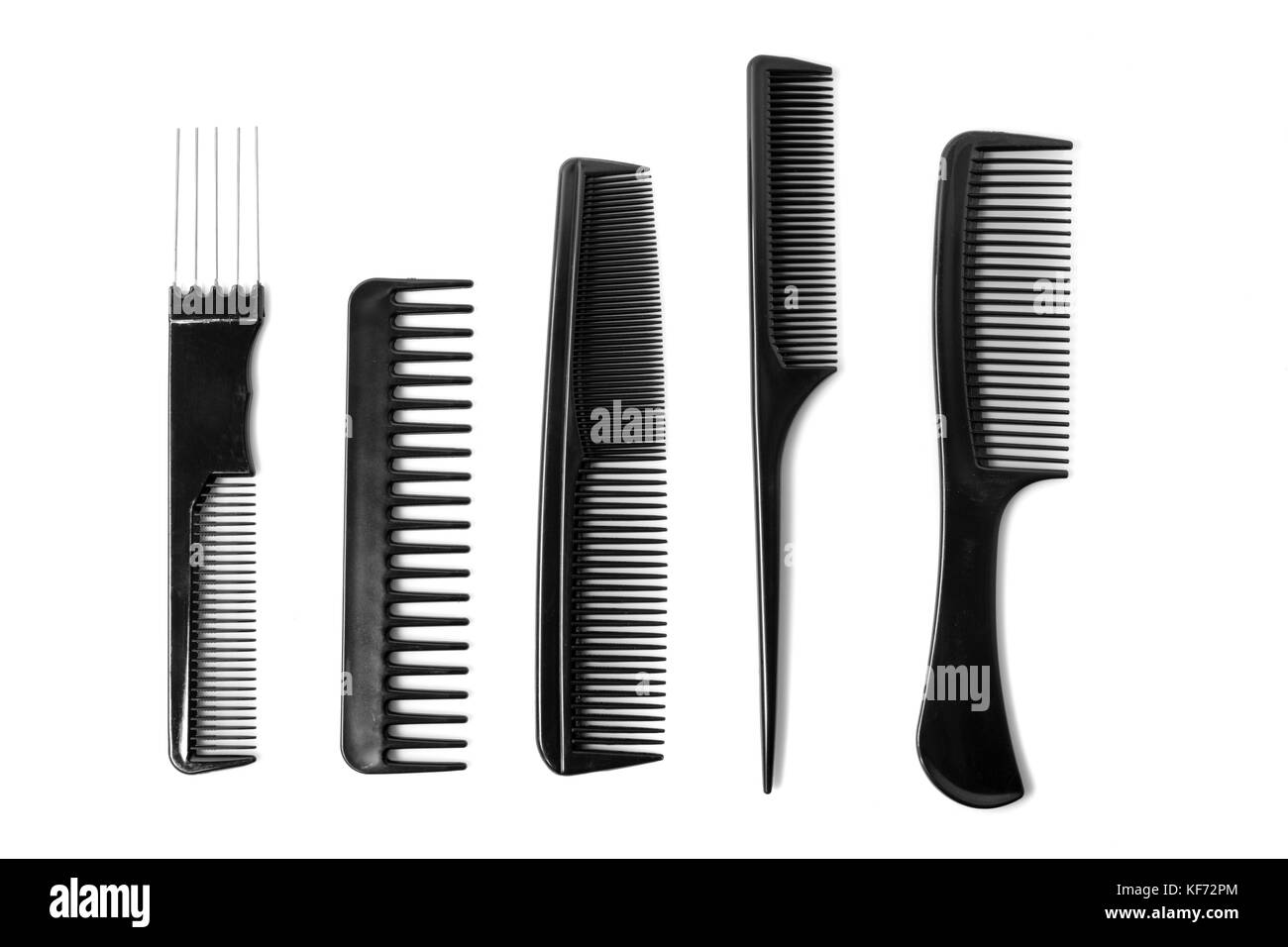 Multiple different combs arranged on a white background Stock Photo - Alamy