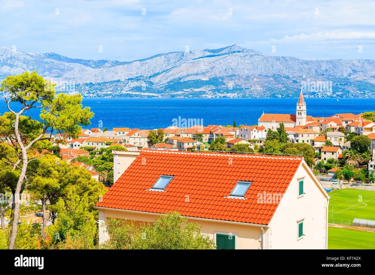 View of Postira town and sea from high road above, Brac island, Croatia ...