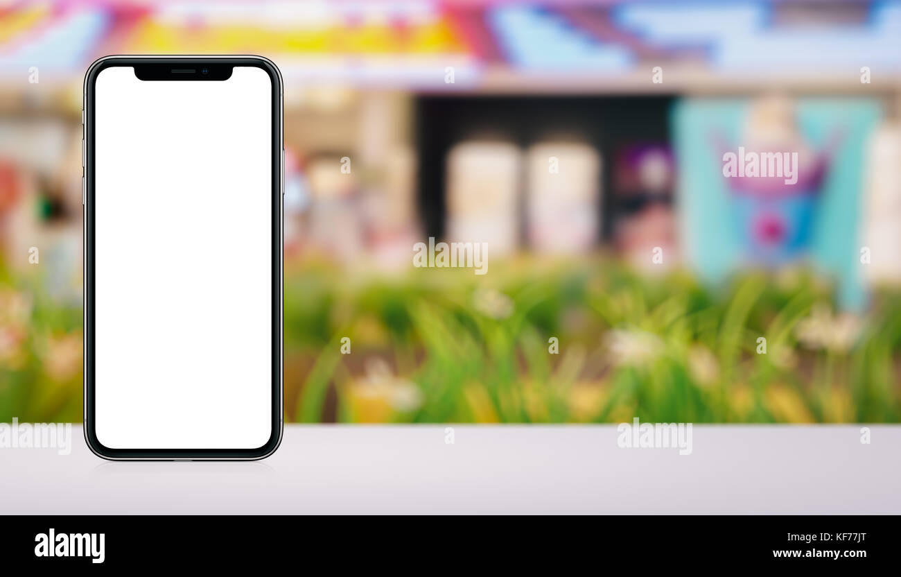 Smartphone mockup similar to iPhone X front and back sides on the desk ...