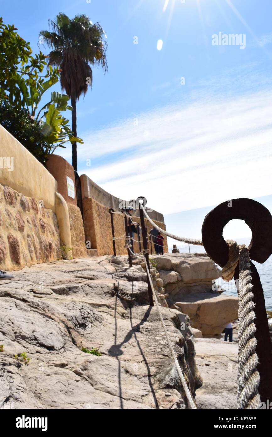 Stone walkway along the beach in Alicante, Spain Stock Photo - Alamy