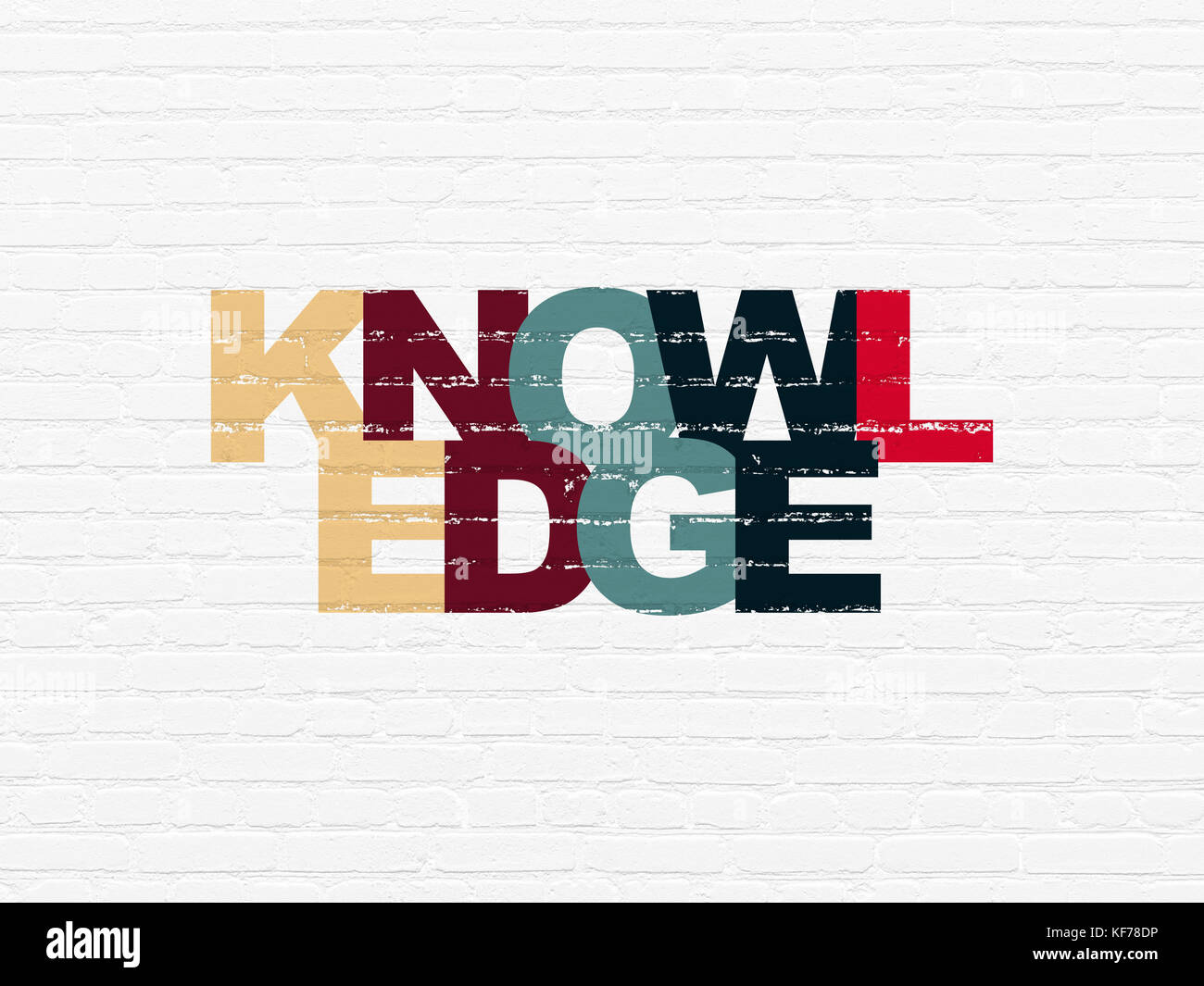 Studying concept: Knowledge on wall background Stock Photo - Alamy
