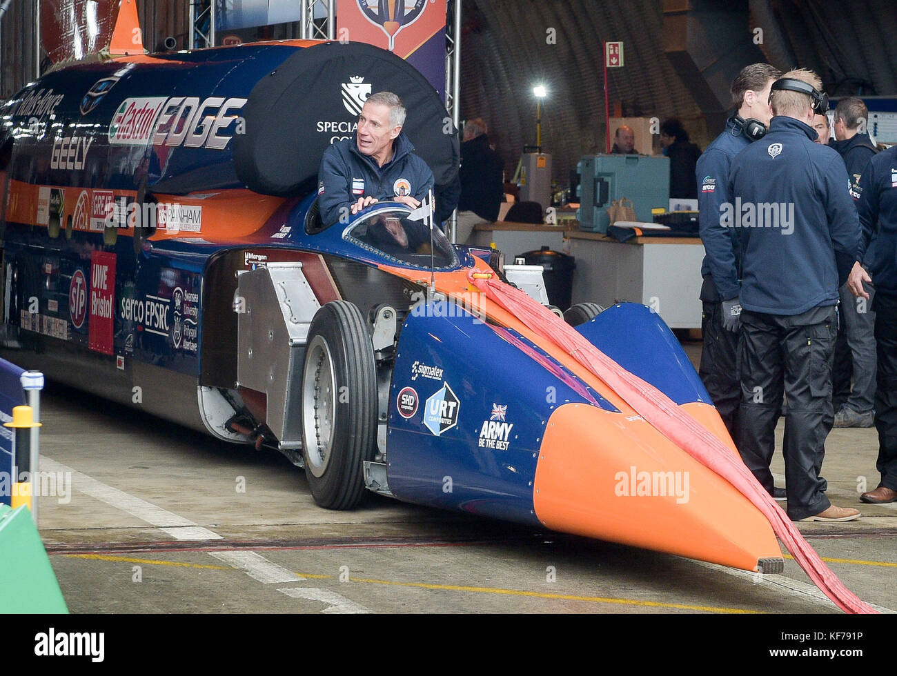 Pilot Andy Green climbs into the cockpit as BLOODHOUND SSC is prepared ...