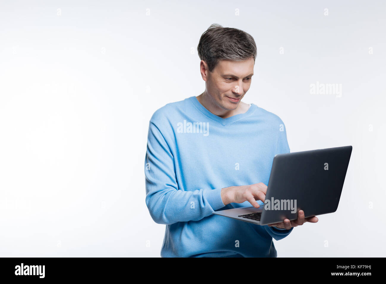 Middle aged entrepreneur working laptop hi-res stock photography and ...