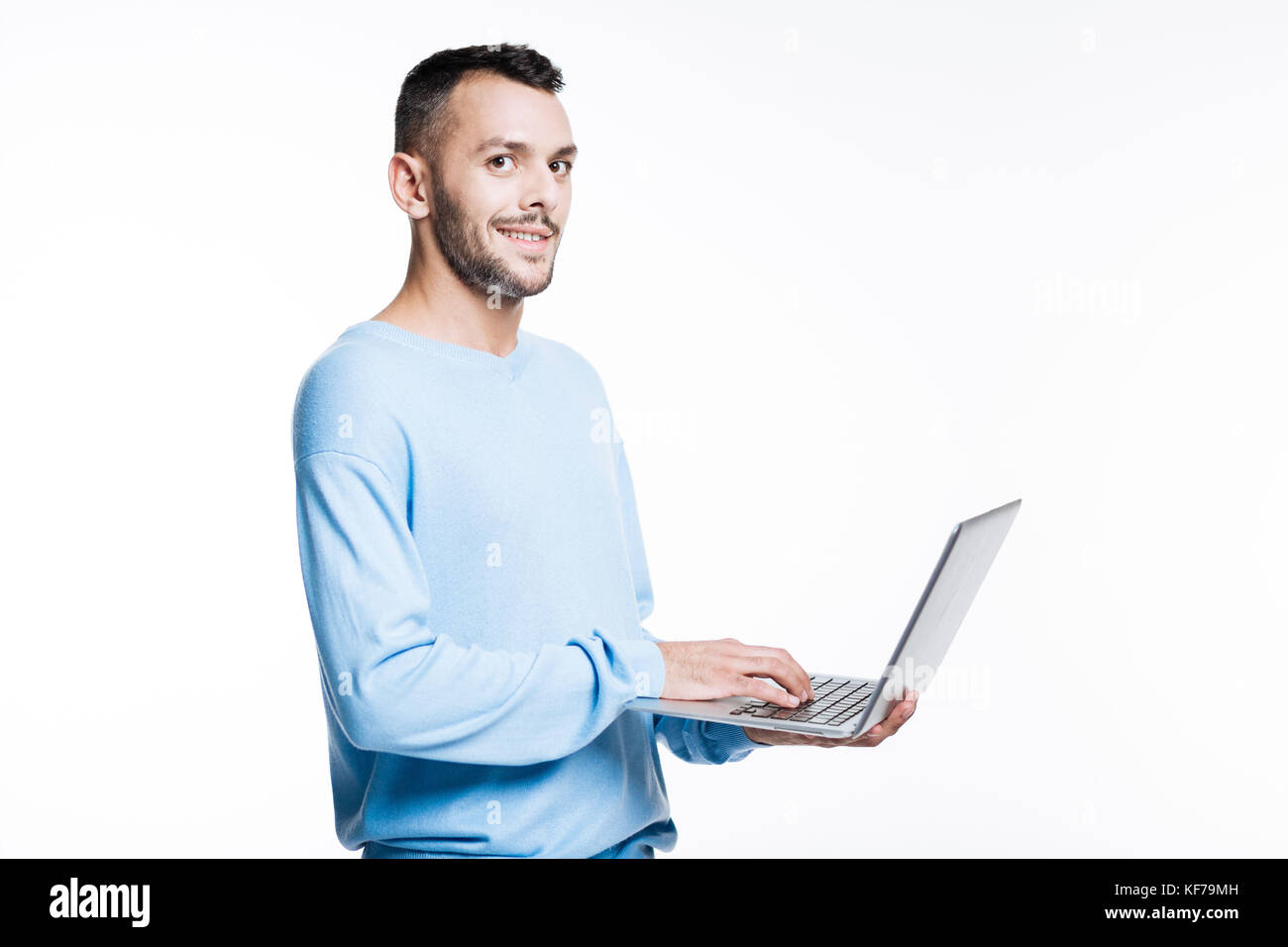 Handsome happy fit male typing hi-res stock photography and images - Alamy