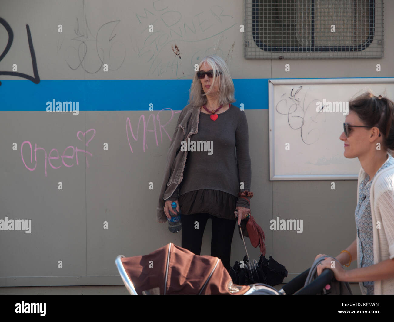 Waiting around on a Brighton street Stock Photo - Alamy