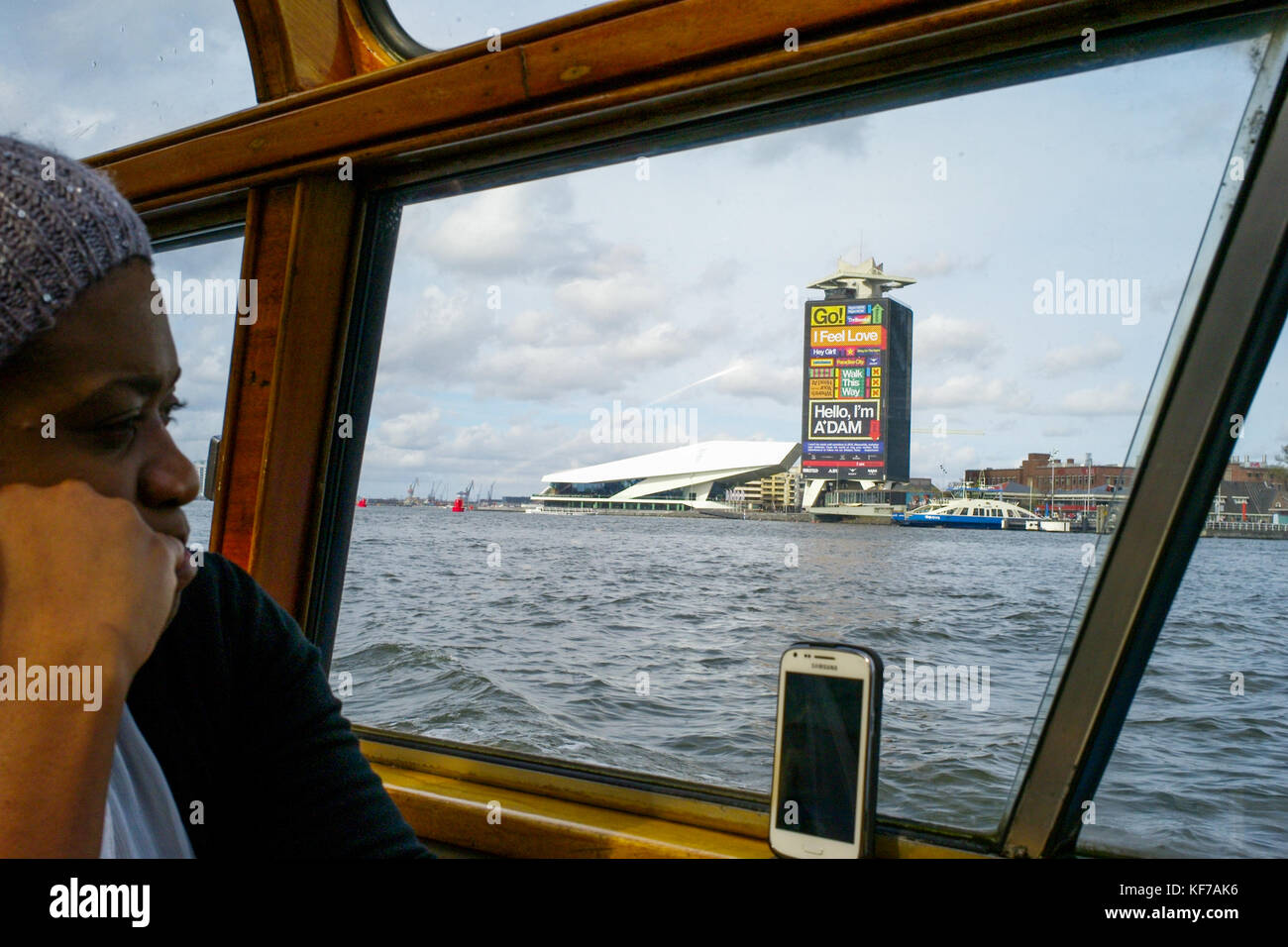 Boat-trip through Amsterdam channels, Netherlands Stock Photo - Alamy
