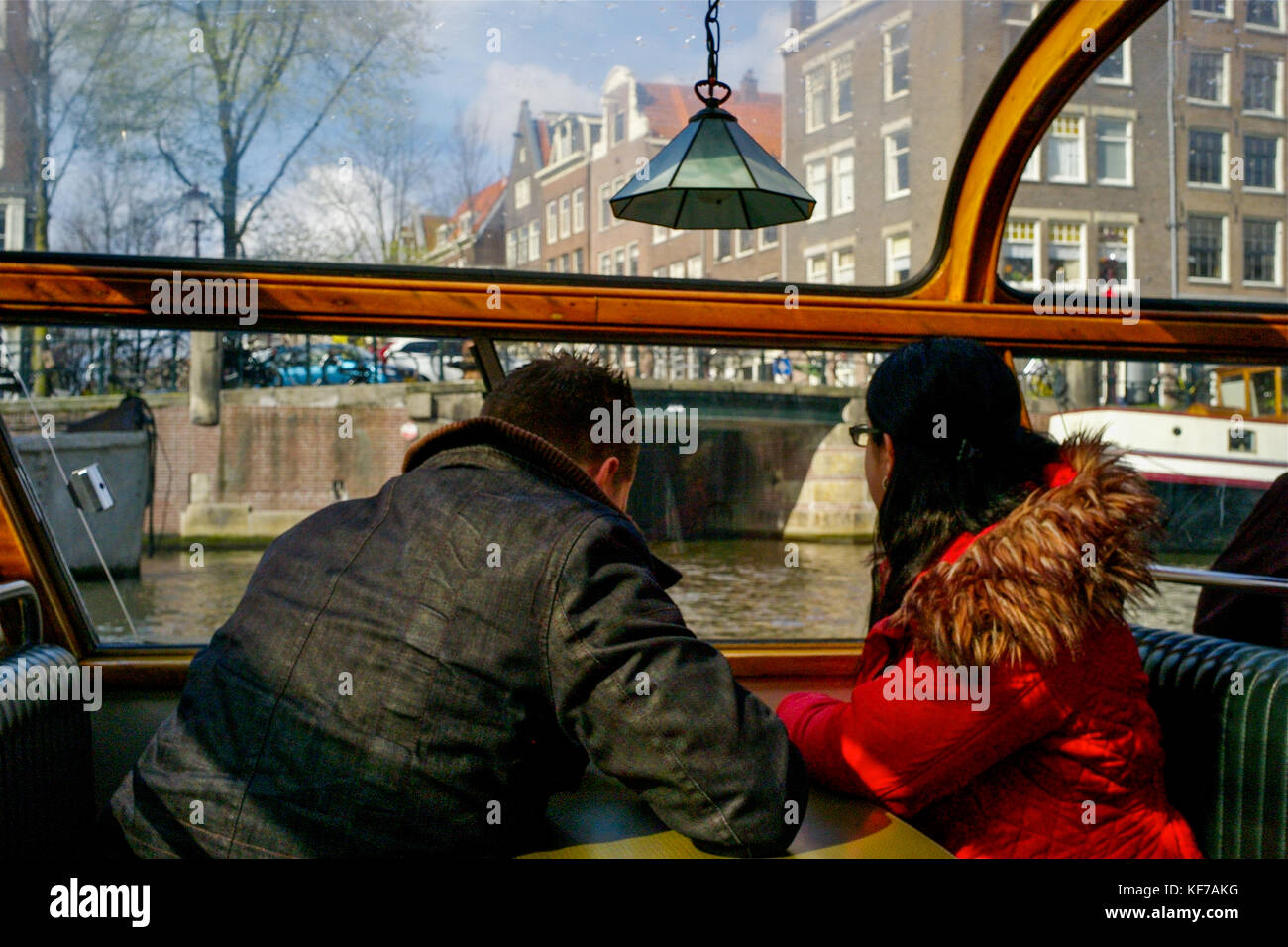 Boat-trip through Amsterdam channels, Netherlands Stock Photo - Alamy