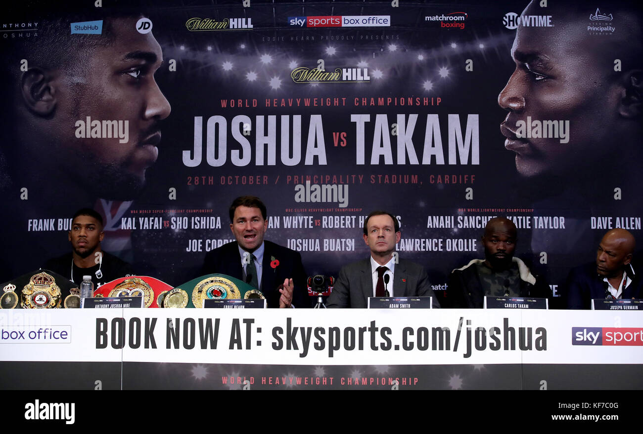 Anthony Joshua (left) and Carlos Takam (right) alongside promoter Eddie ...