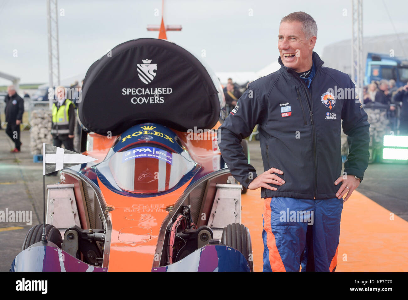 Pilot Andy Green stands beside the Bloodhound 1,000mph supersonic ...