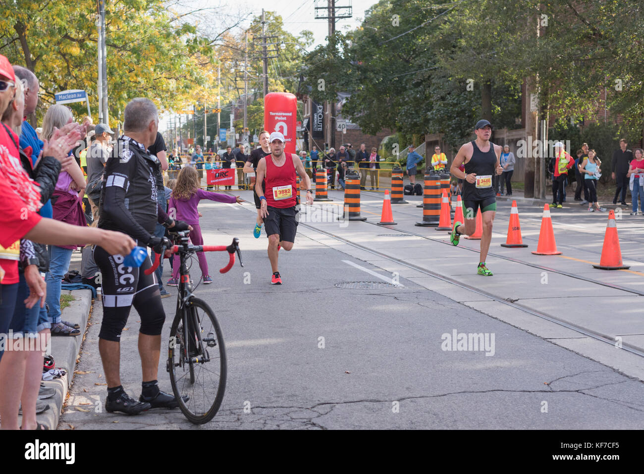 TORONTO, ON/CANADA - OCT 22, 2017: Marathon runners passing the 33km ...