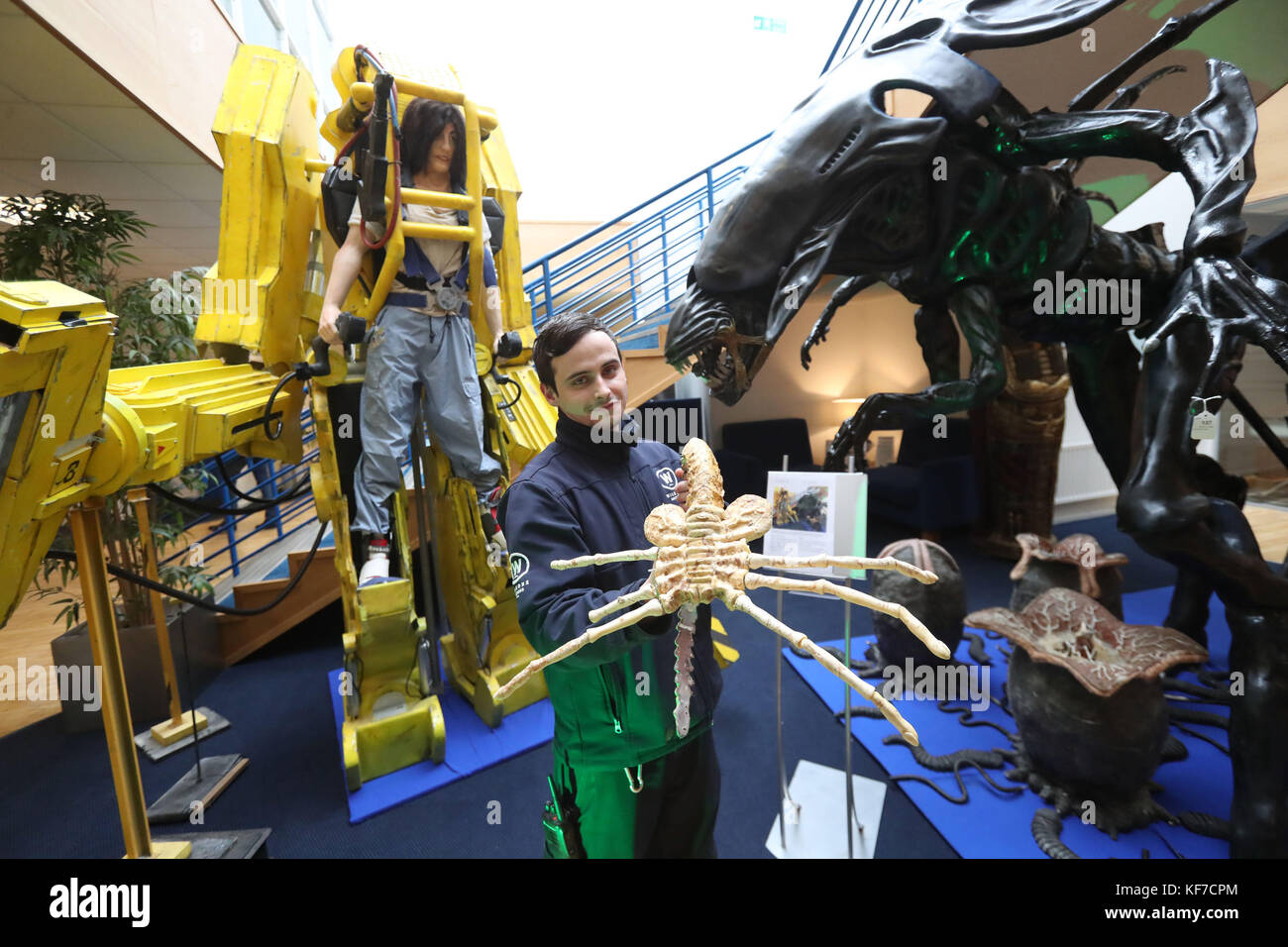 Reece Morrison of Wilsons Auctions helps display Alien movie replicas ...