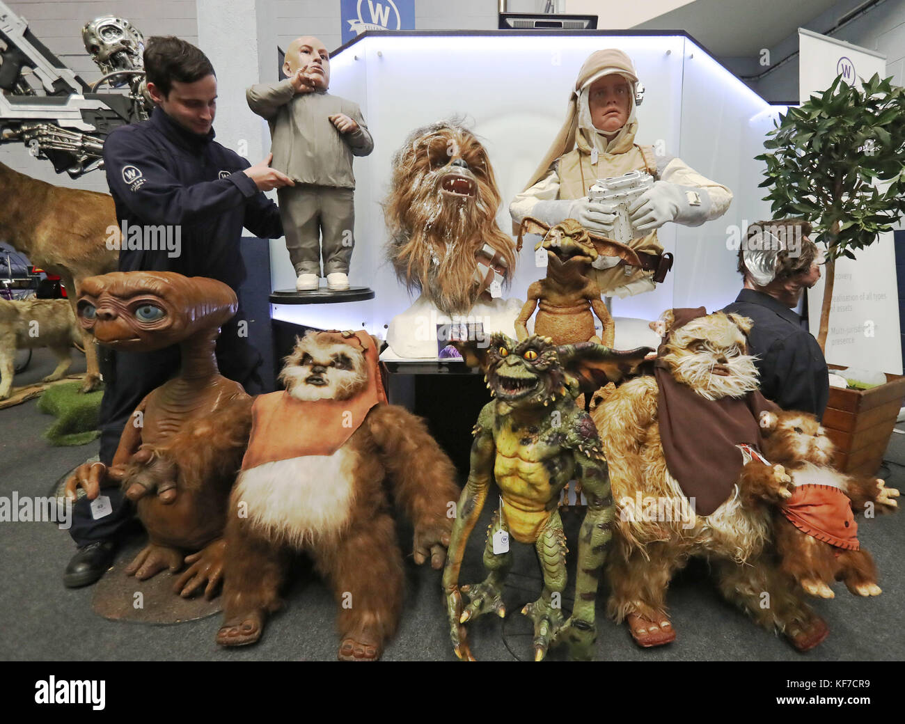 Reece Morrison of Wilsons Auctions helps display hundreds of items of ...