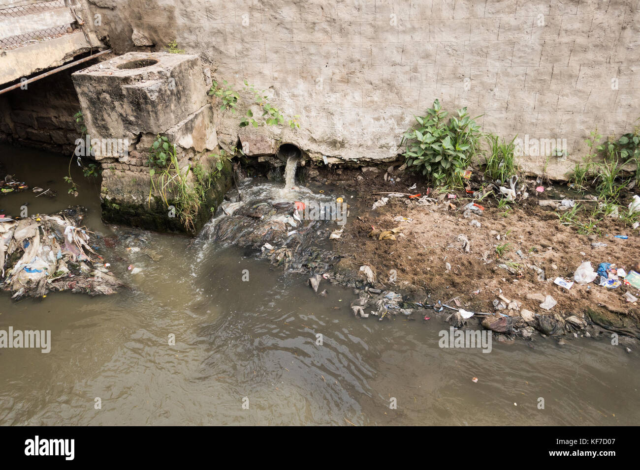 HYDERABAD,INDIA-22 OCTOBER,2017 sewage filth flows into what once used ...