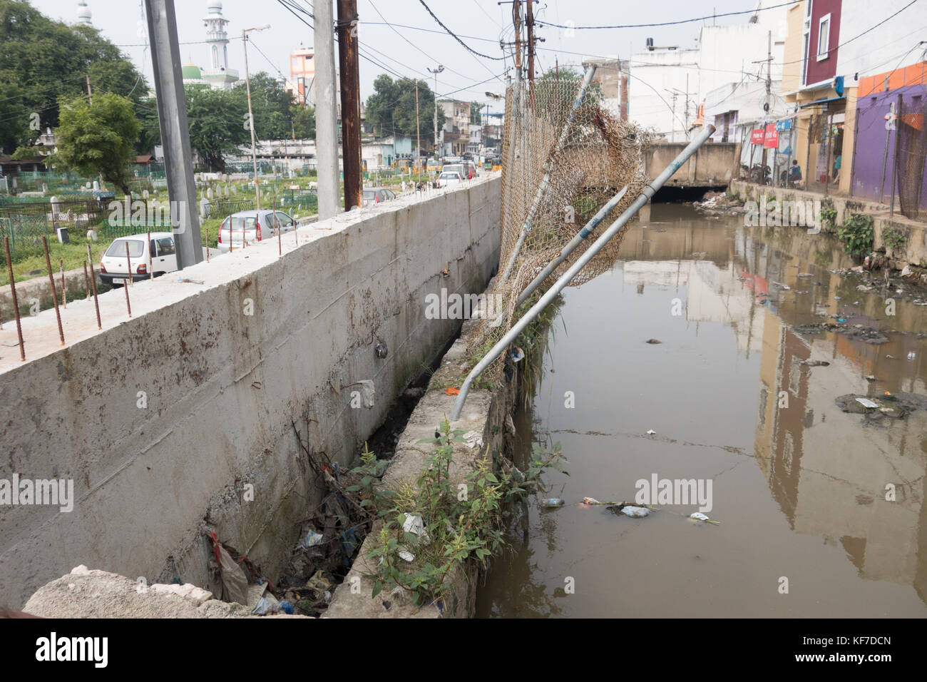 HYDERABAD, INDIA - OCTOBER 22,2017. Concrete bund wall built to prevent ...