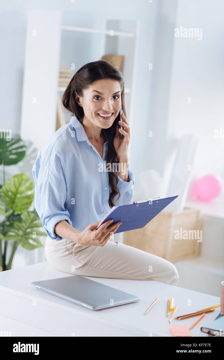 Cheerful smart businesswoman being at work Stock Photo - Alamy