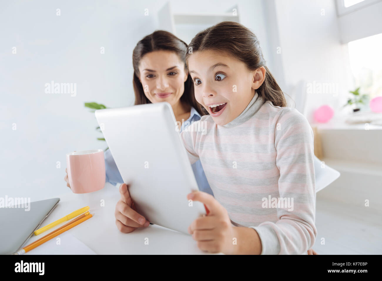 Positive emotional girl being excited Stock Photo - Alamy