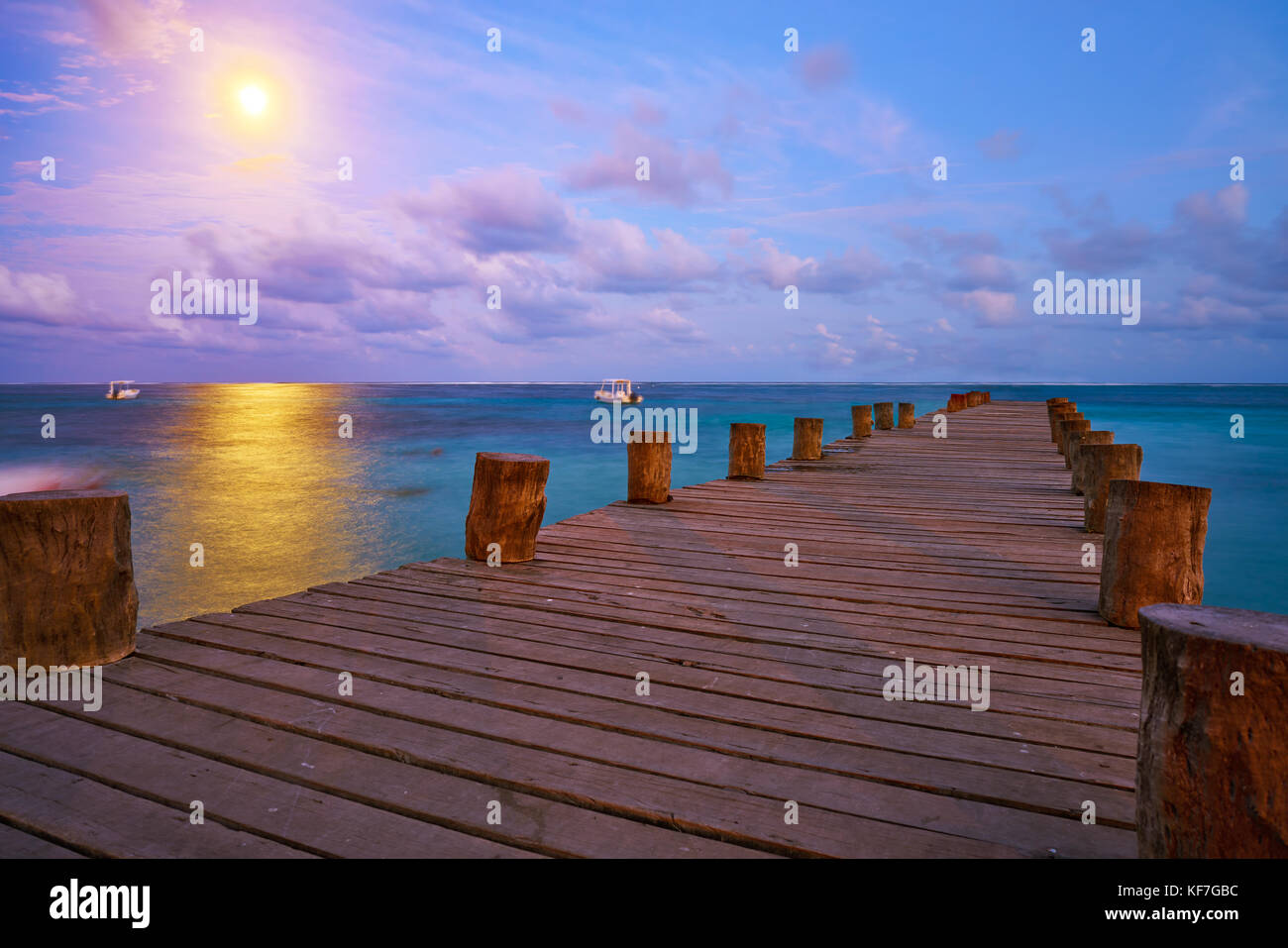 Sunset at Riviera Maya pier in Mayan Mexico Stock Photo - Alamy