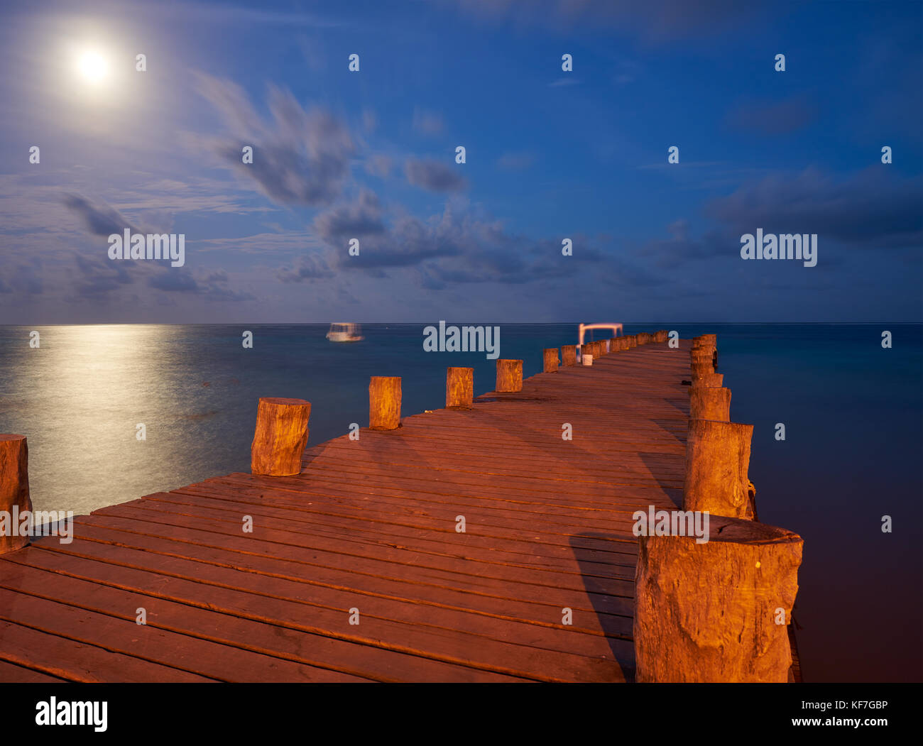 Sunset at Riviera Maya pier in Mayan Mexico Stock Photo - Alamy