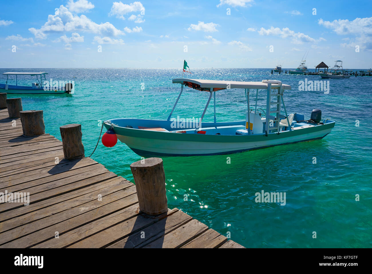 Riviera Maya wood pier and boats in Mayan Mexico Stock Photo - Alamy