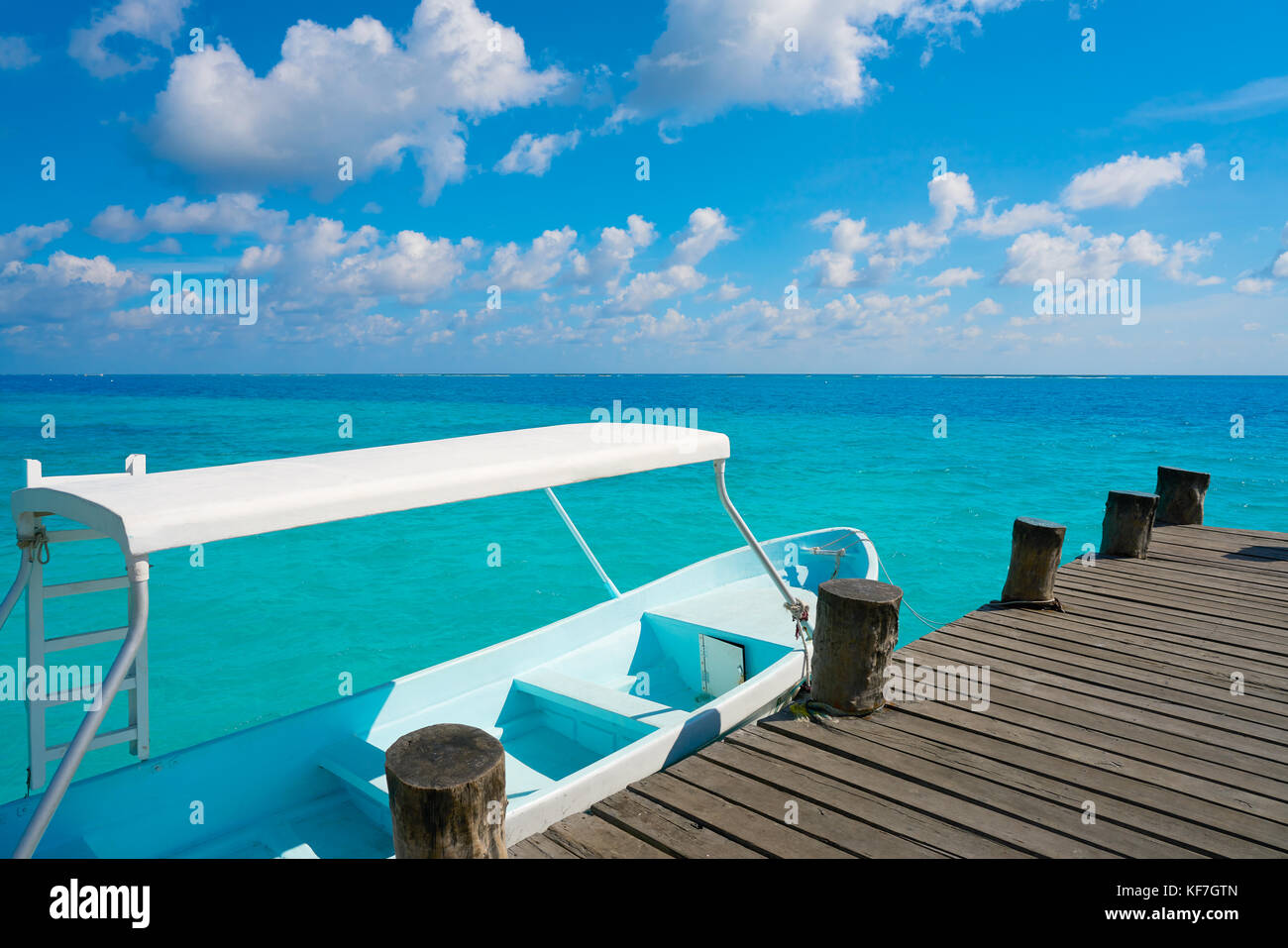 Riviera Maya wood pier and boats in Mayan Mexico Stock Photo - Alamy