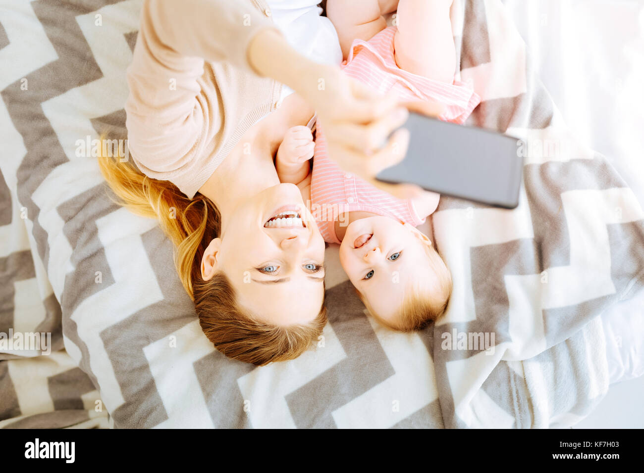 Funny relatives making photos together Stock Photo - Alamy
