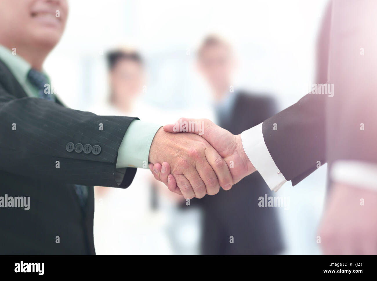 Closeup of handshake as a sign of successful cooperation and interest ...