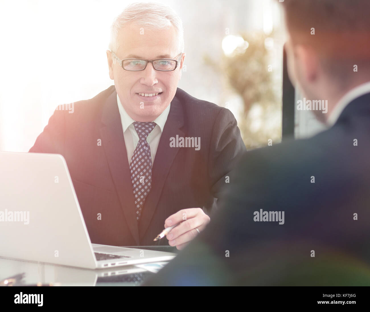 Two successful business people in office Stock Photo - Alamy