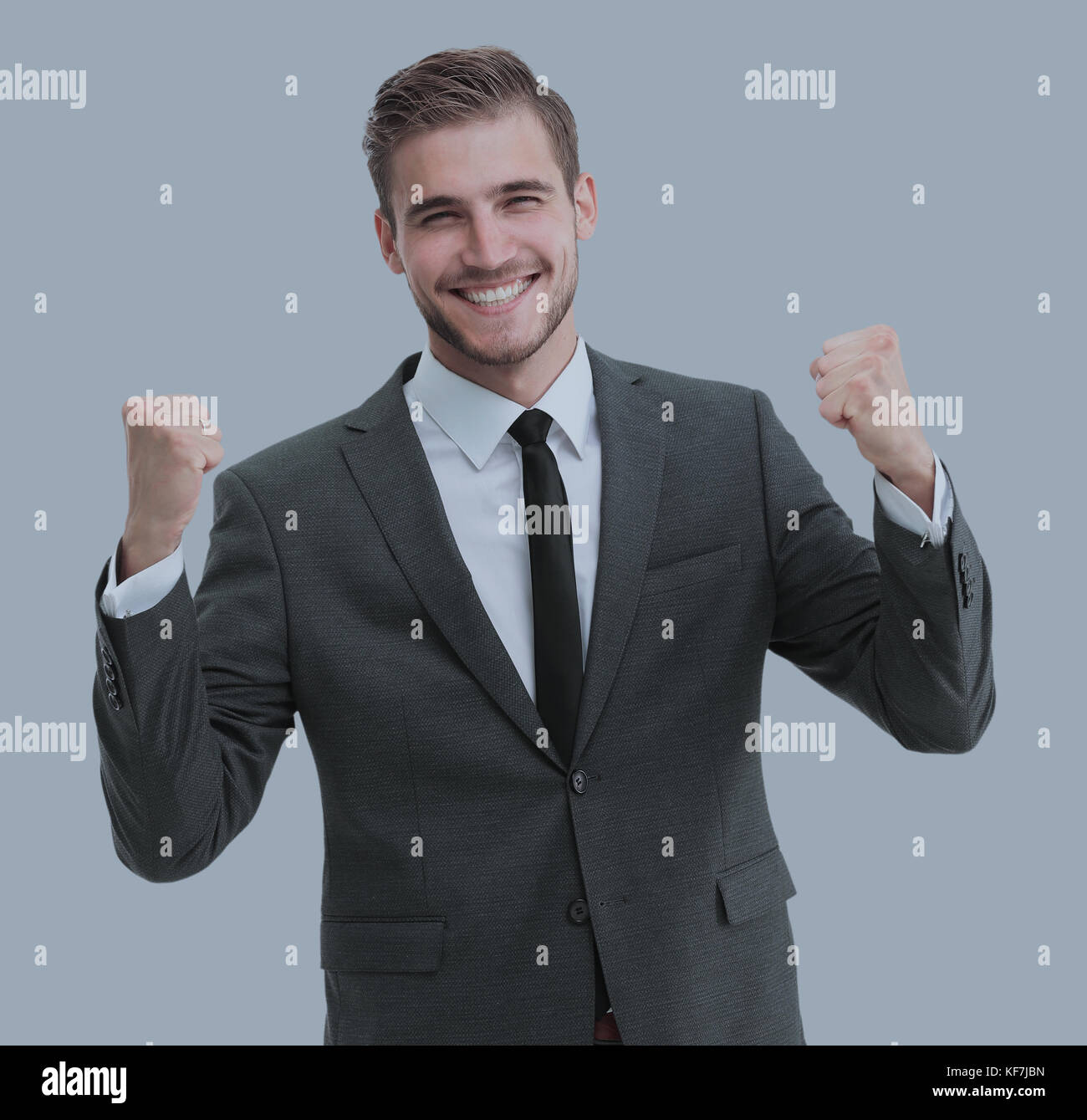Portrait of successful business man winner celebrating Stock Photo - Alamy