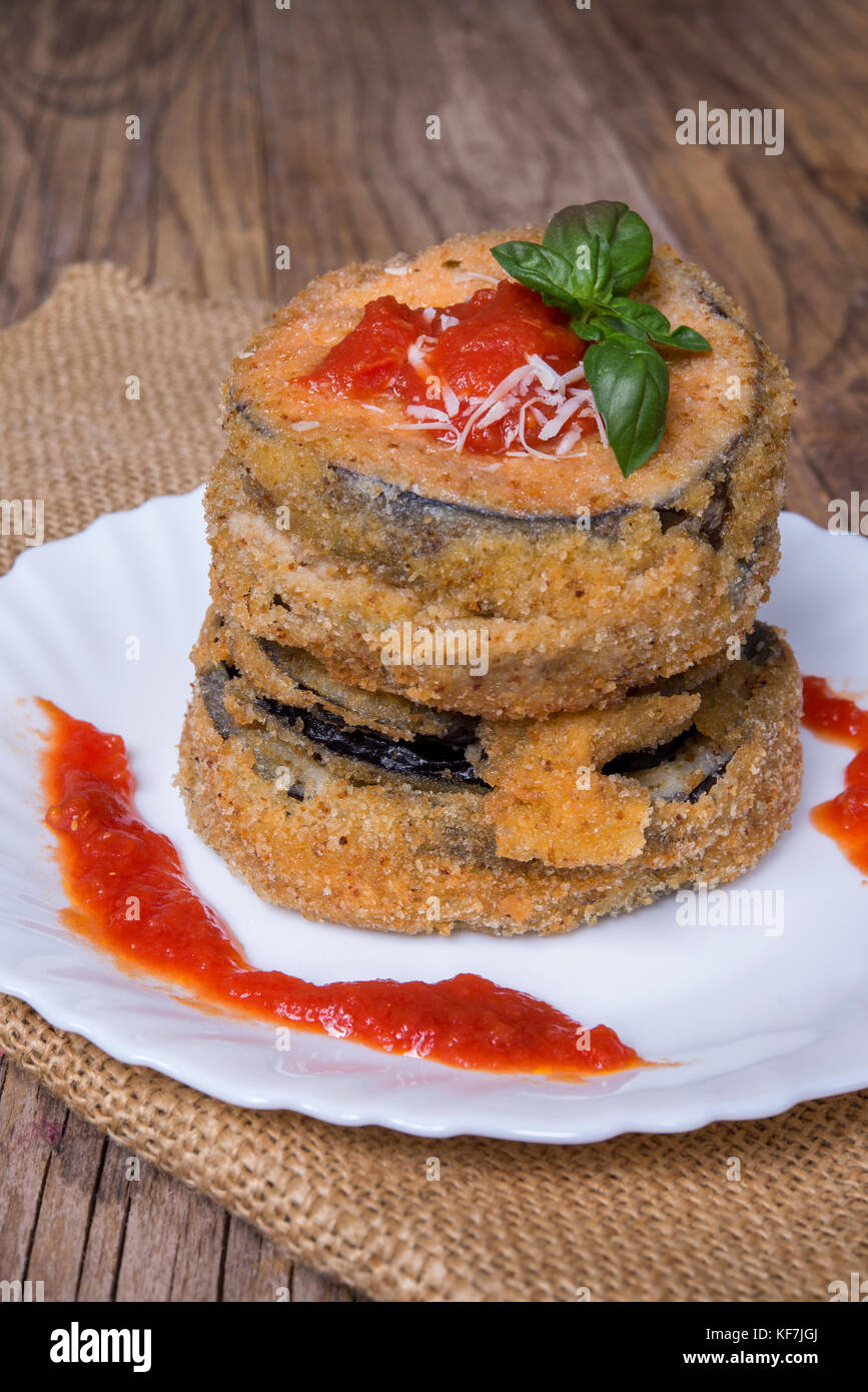 Round eggplant blanched with grated bread and fried bread stuffed with ...